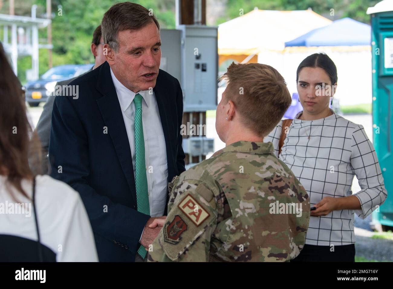 Virginia Senator Mark R. Warner speaks with U.S. Air Force Capt ...