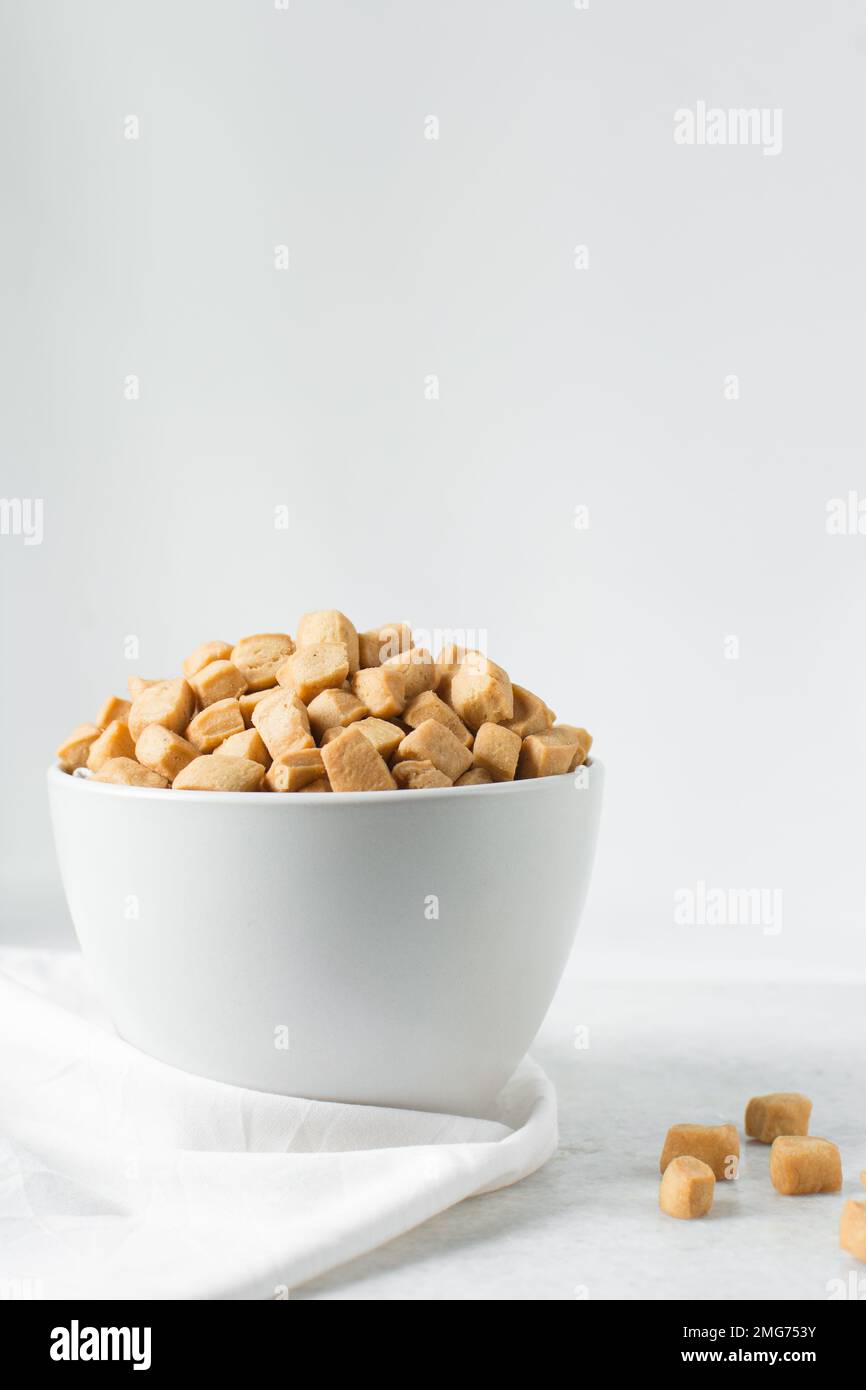 Nigerian Chin chin in a ceramic bowl, Fried chin-chin snack in a bowl ...