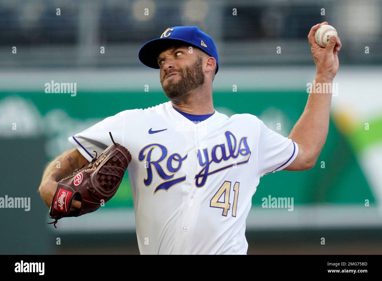 Kansas City Royals starting pitcher Danny Duffy delivers to a Minnesota ...
