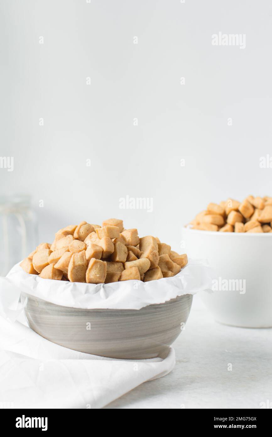 Nigerian Chin chin in a ceramic bowl, Fried chin-chin snack in a bowl ...