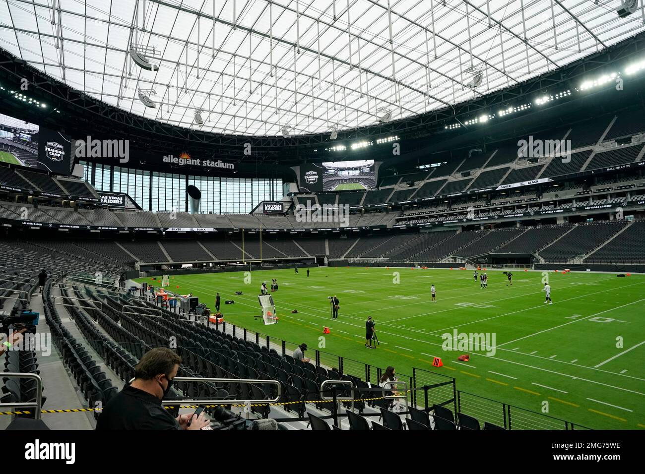 Las Vegas Raiders players train at Allegiant Stadium during an NFL ...