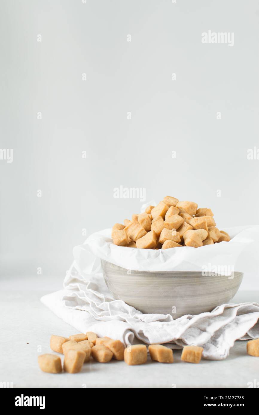 Nigerian Chin chin in a ceramic bowl, Fried chin-chin snack in a bowl ...