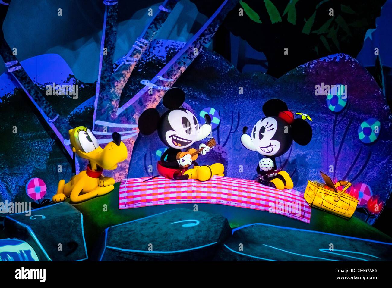 Disney characters Pluto, Mickey Mouse and Minnie Mouse are seen in the ...