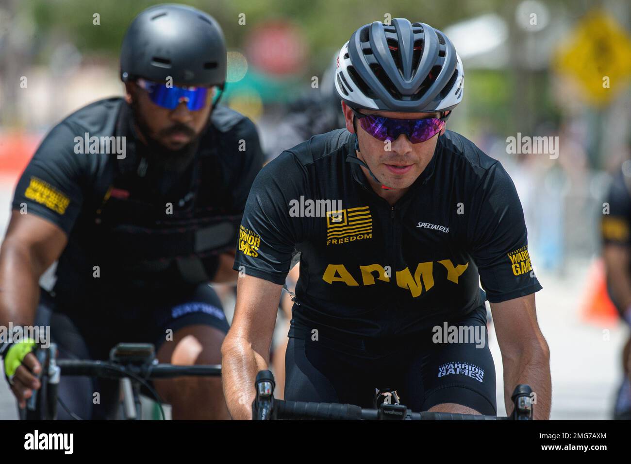 U.S. Army 1st. Lt. Ryan Arthur competes in a cycling competition during ...