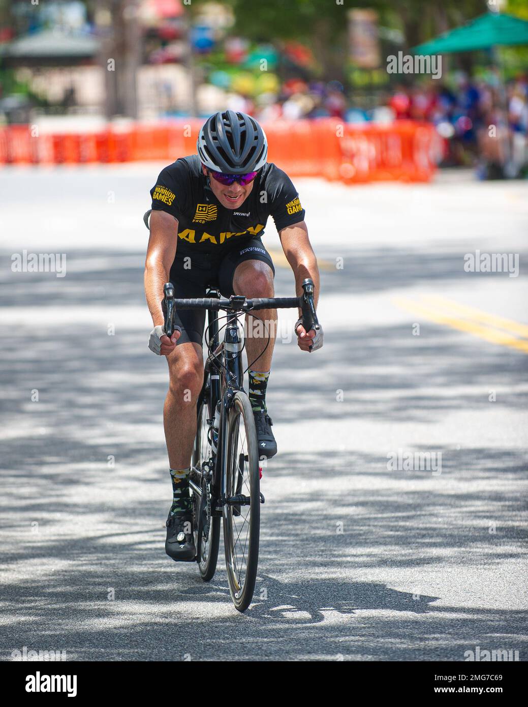 U.S. Army 1st Lt. Ryan Arthur competes in a cycling competition during ...