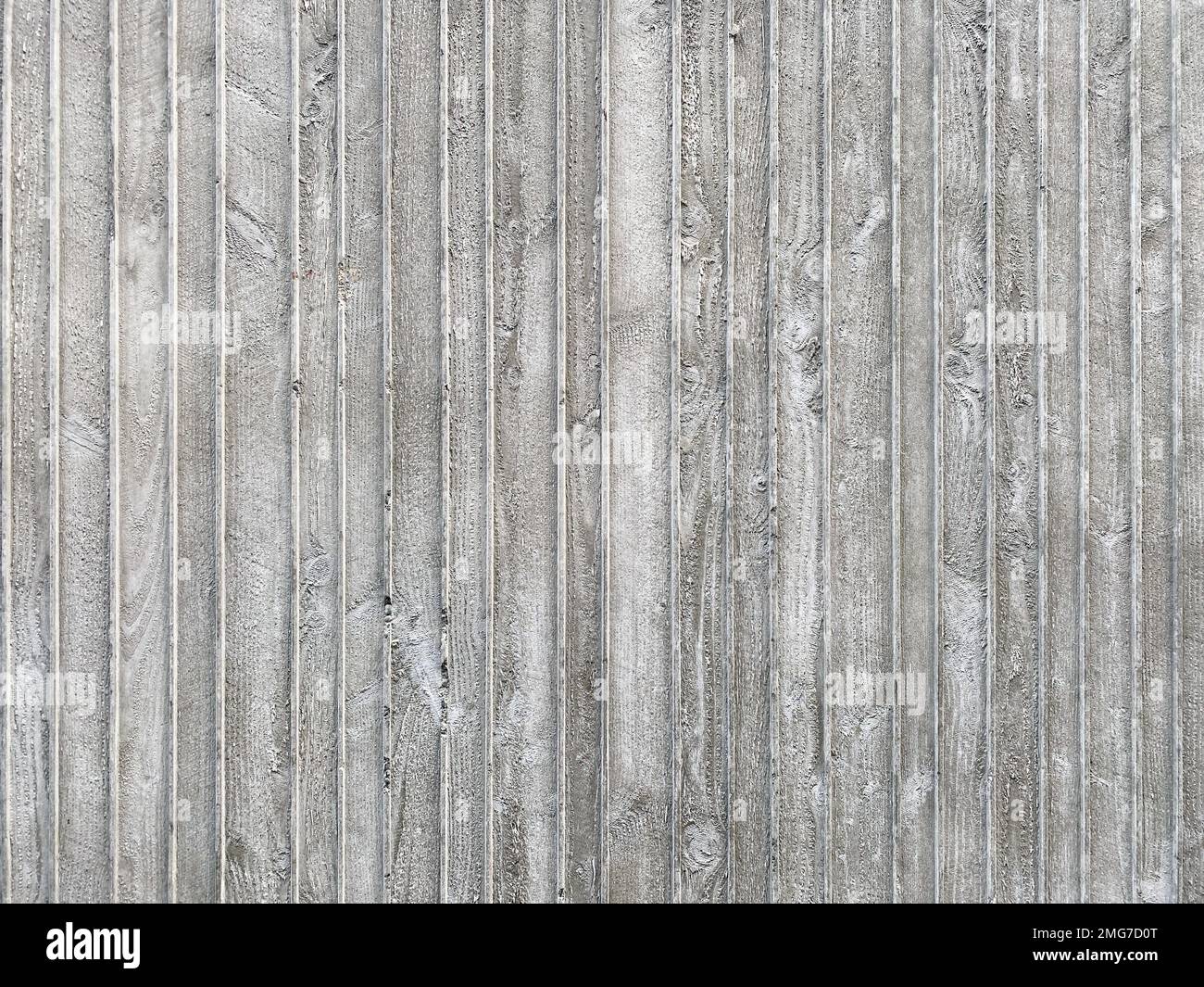 Close-up of a precast tilt slap concrete wall background with wood ...