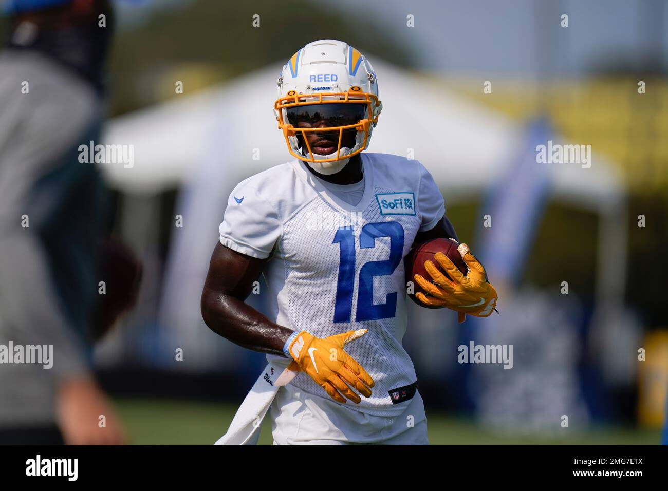 Los Angeles Chargers wide receiver Joe Reed walks across the field ...