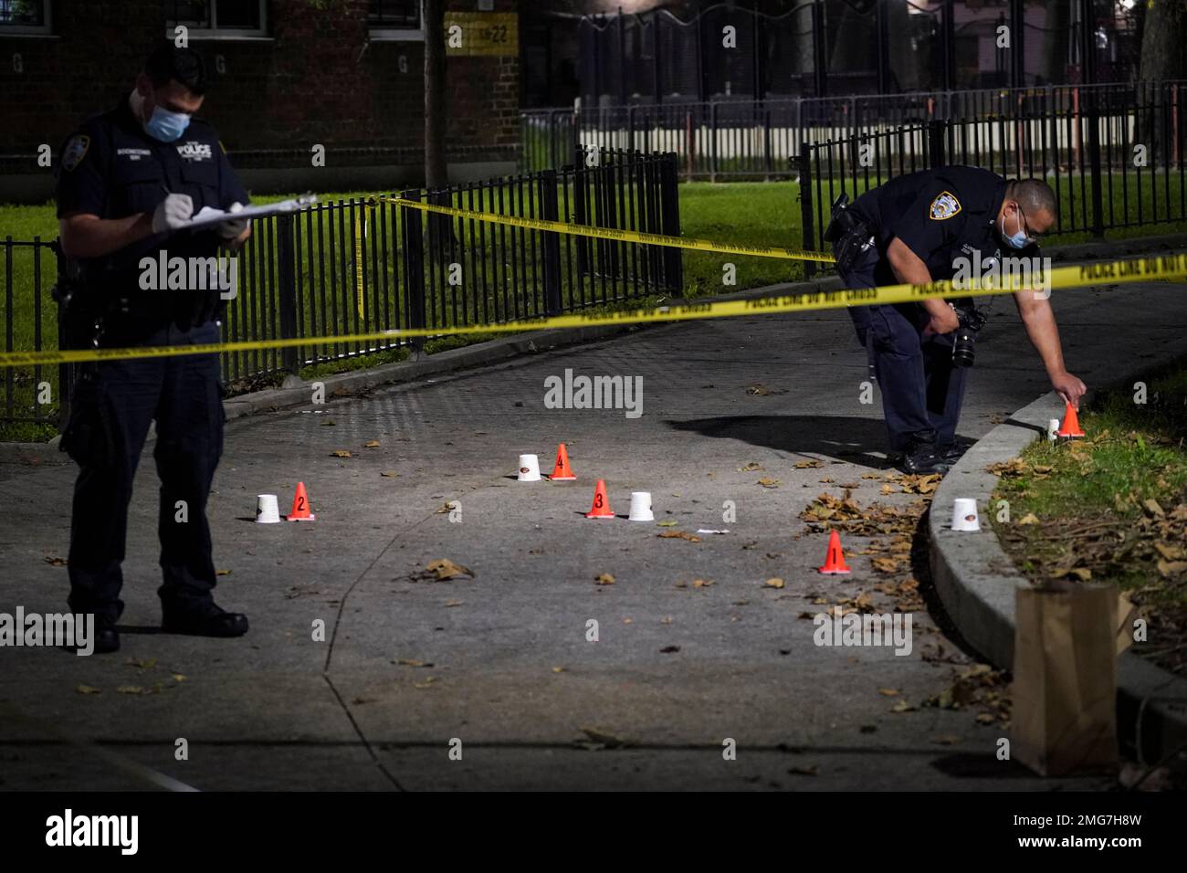 New York City Police Department Officers Mark Bullet Casings With Cones