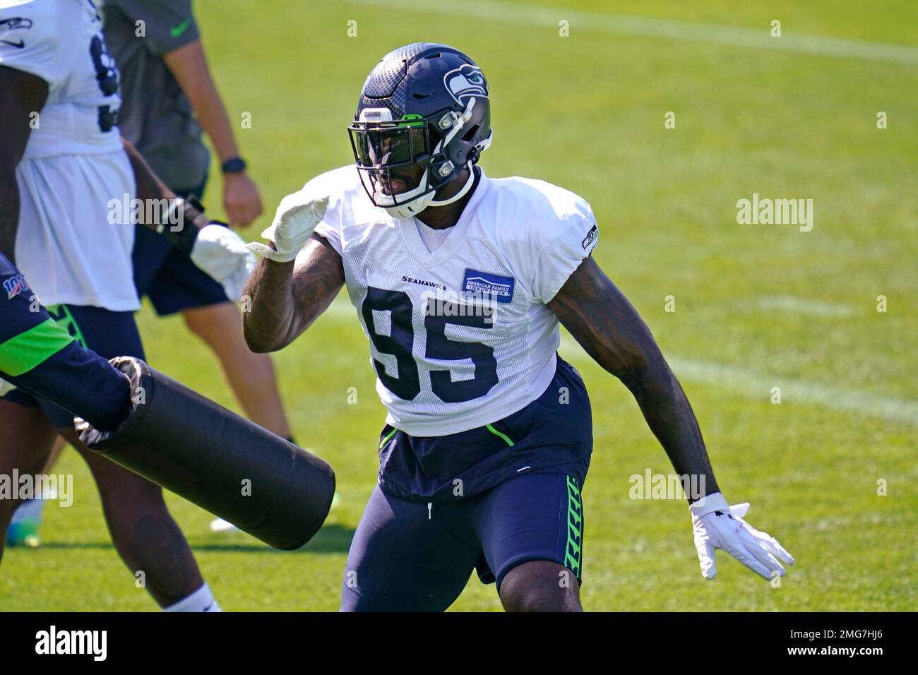 Seattle Seahawks defensive end Benson Mayowa runs through a drill ...