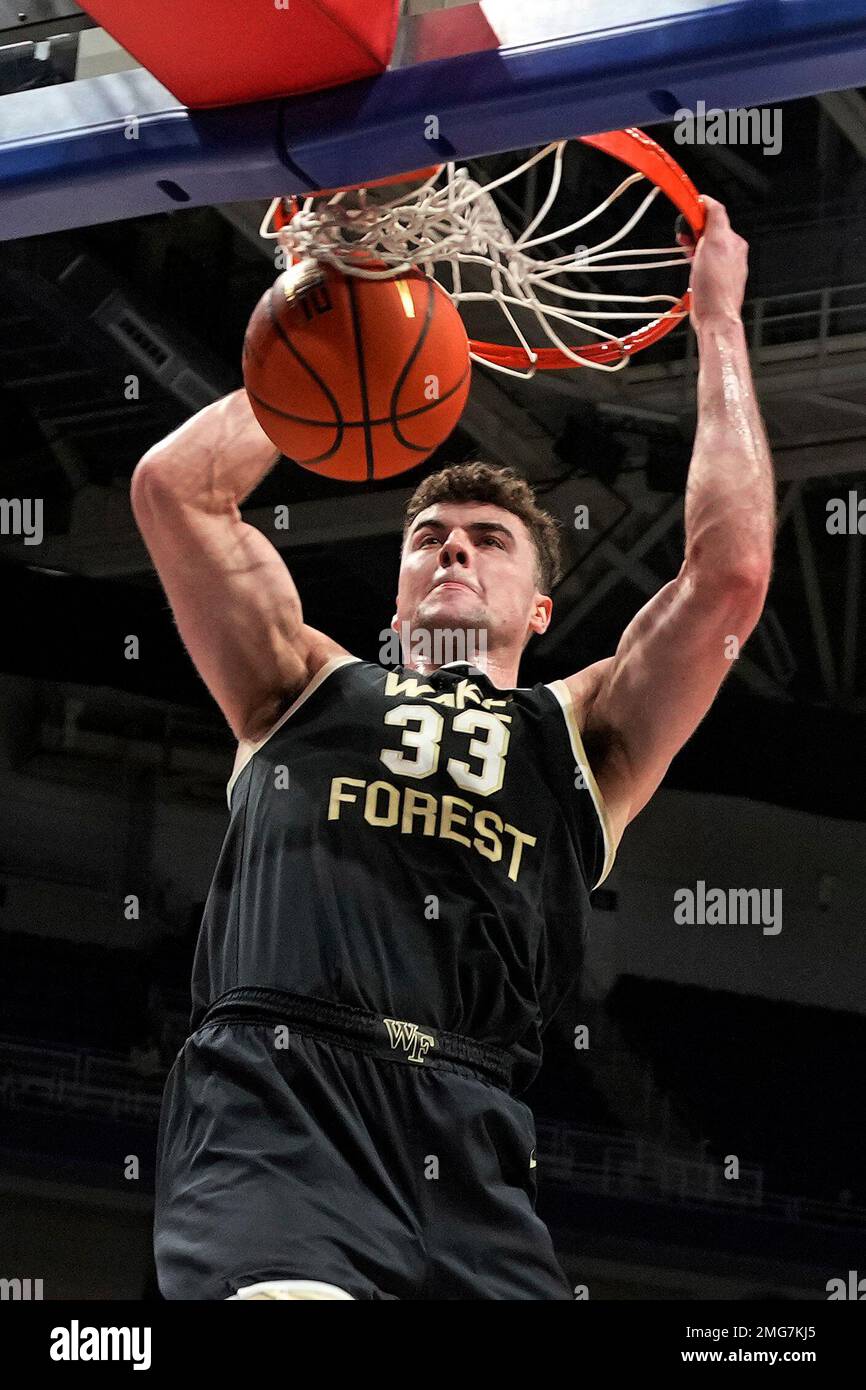 Wake Forest forward Matthew Marsh (33) dunks the basketball during the ...