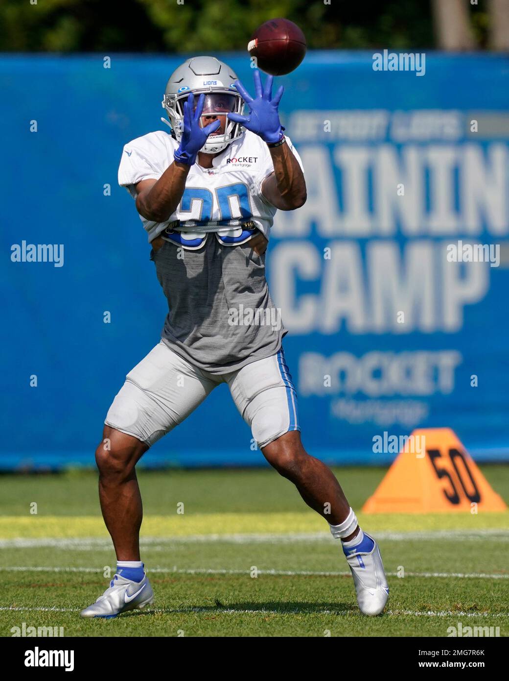 Detroit Lions cornerback Jamal Agnew catches during drills at the Lions ...