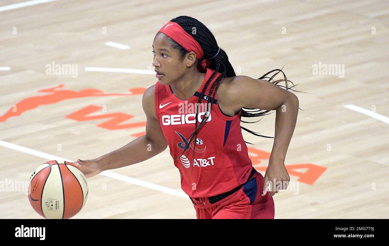 Washington Mystics guard Stella Johnson brings the ball up the court ...