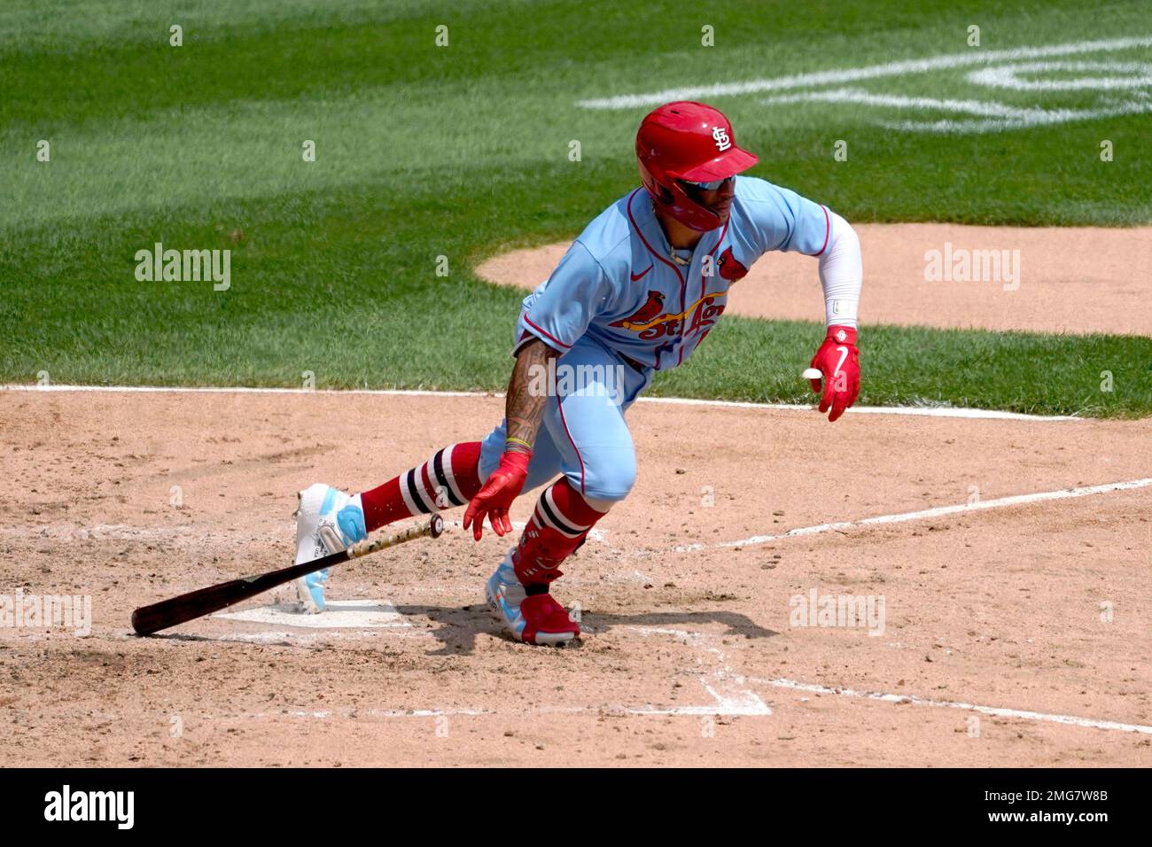 St. Louis Cardinals' Kolten Wong watches his hit during a baseball game ...