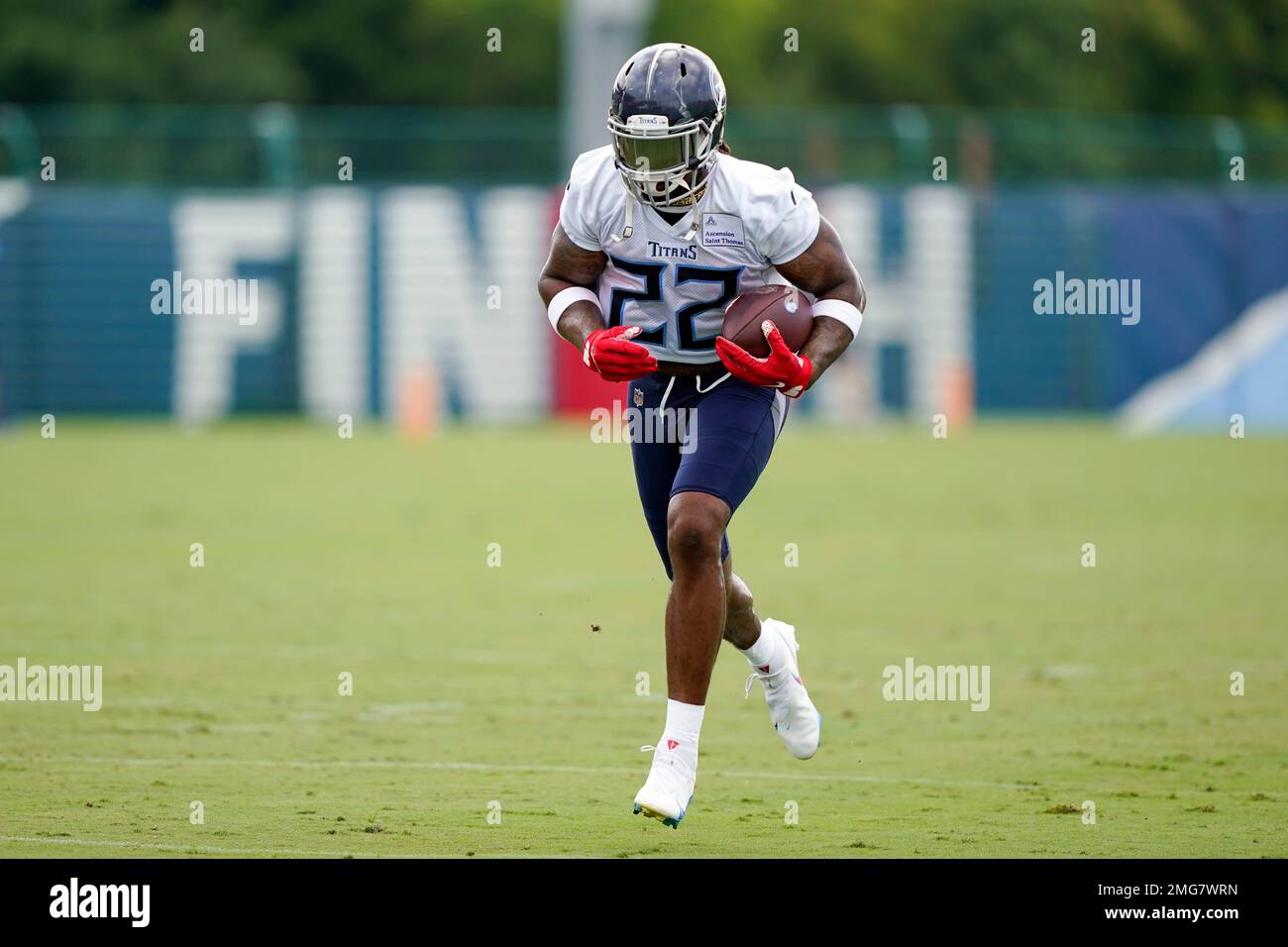 Tennessee Titans running back Derrick Henry runs a drill during NFL ...