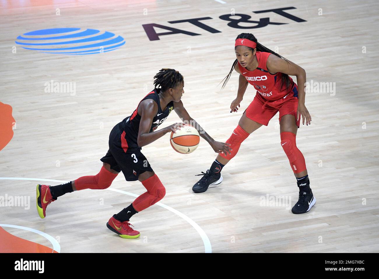 Washington Mystics guard Stella Johnson, right, defends against Las ...