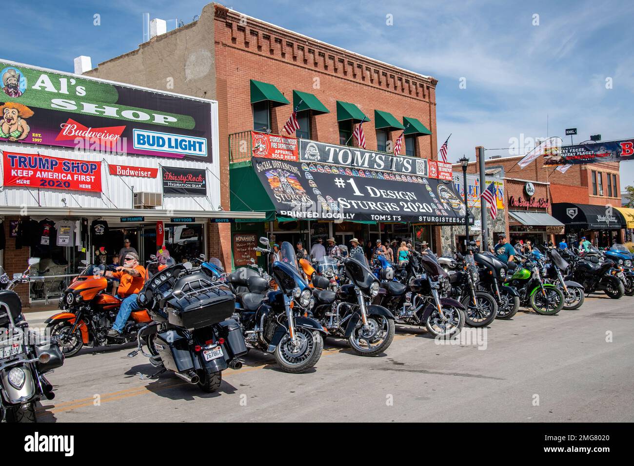 Motorcycles are parked along Main Street during the 80th annual Sturgis ...