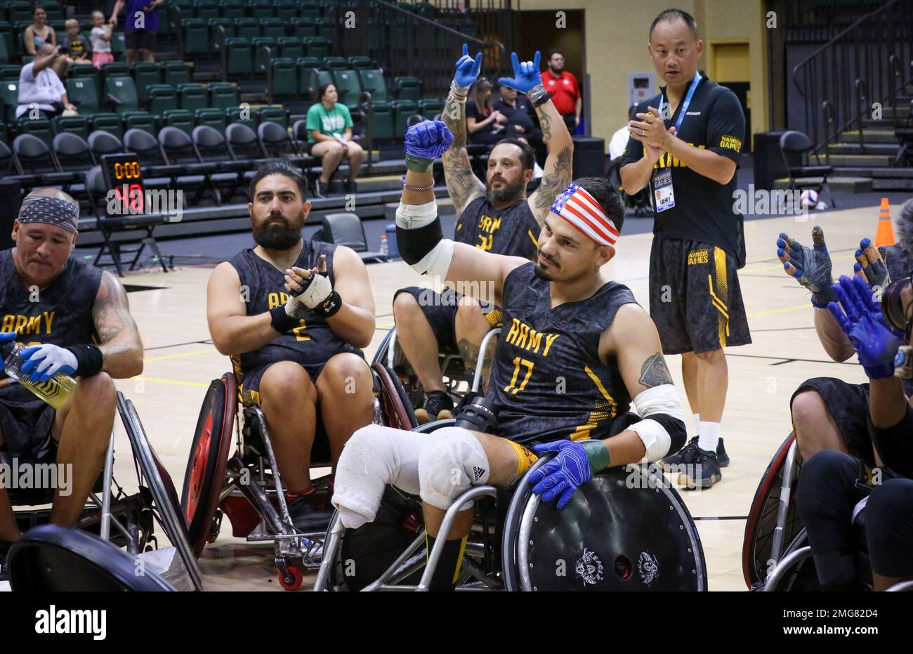 U.S. Army athletes acknowledge the crowd after competing in the ...