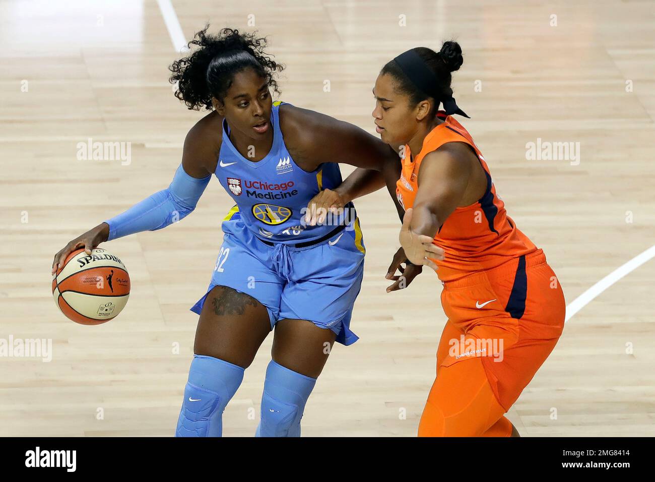 Chicago Sky forward Cheyenne Parker (32) drives around Connecticut Sun ...