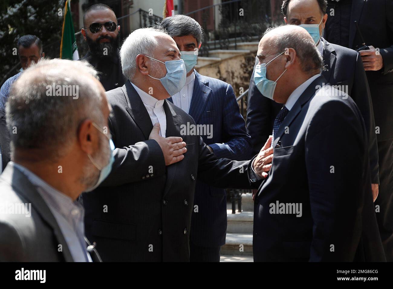 Iranian Foreign Minister Mohammad Javad Zarif, center, and his Lebanese ...
