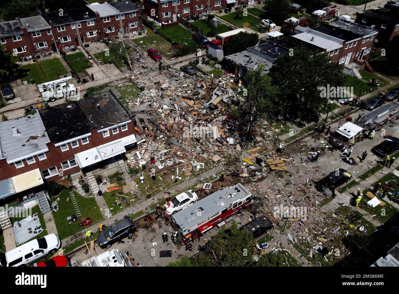 Debris and rubble covers the ground in the aftermath of an explosion in ...