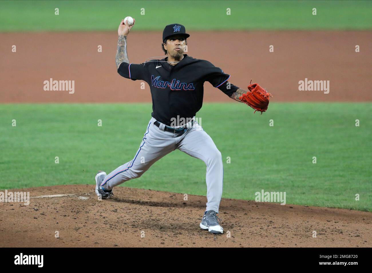 Miami Marlins relief pitcher Sterling Sharp throws a pitch to the ...