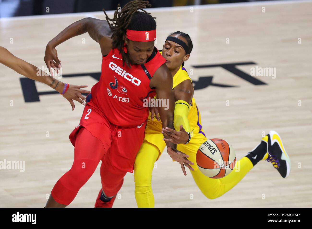 Los Angeles Sparks' Brittney Sykes, right, knocks the ball away from ...