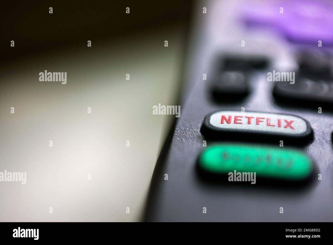 This Aug. 13, 2020, photo shows logos for Netflix and Hulu on a remote ...