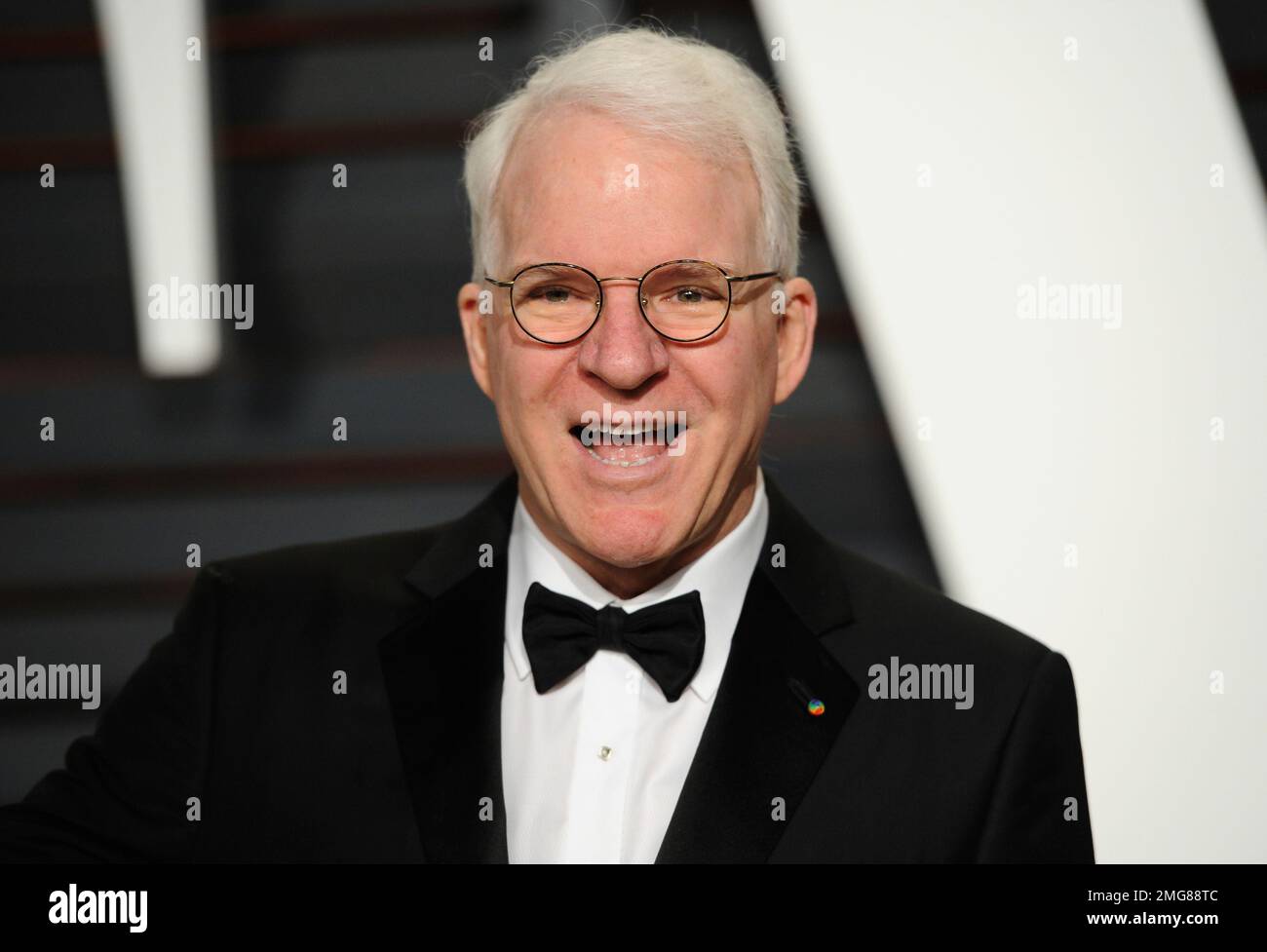 Actor-comedian Steve Martin arrives at the 2015 Vanity Fair Oscar Party ...