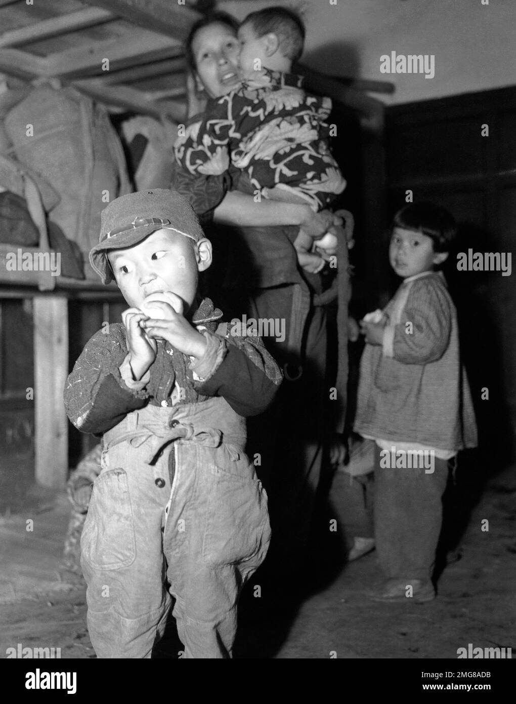 FILE - In this Oct. 12, 1946, file photo, a Japanese youngster, hungry ...