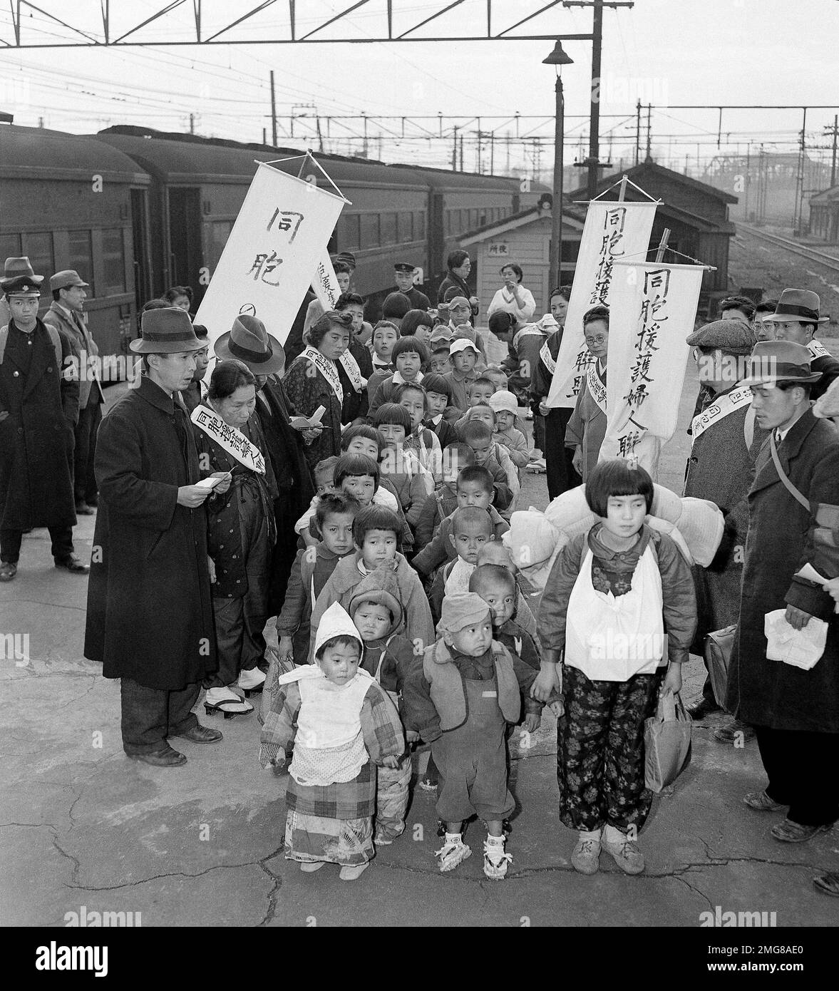 FILE - In this Dec. 6, 1946, file photo, Sober-faced young Japanese war ...