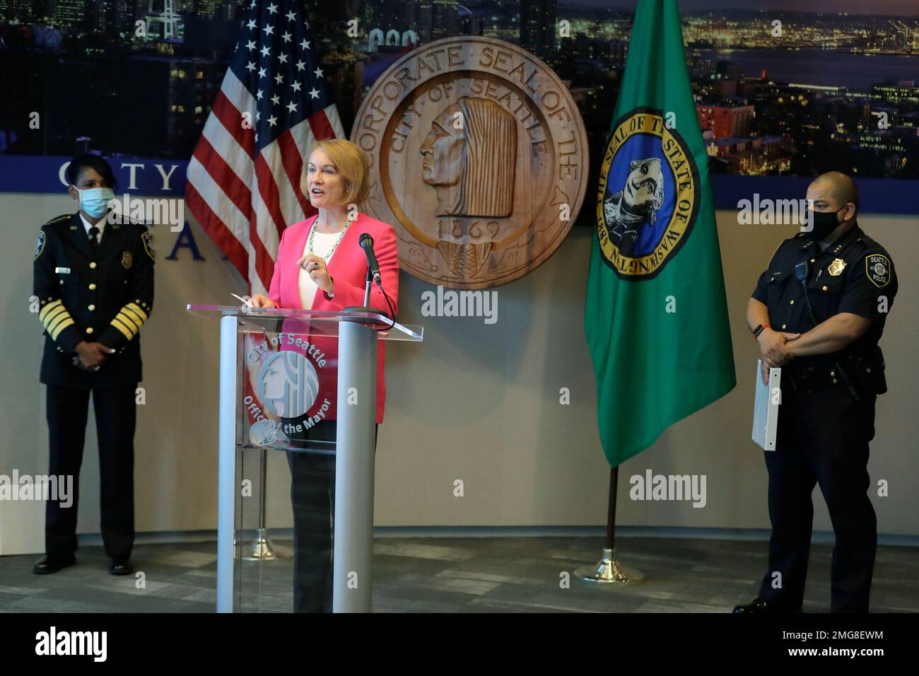 Seattle Mayor Jenny Durkan, center, speaks as Seattle Police Chief ...