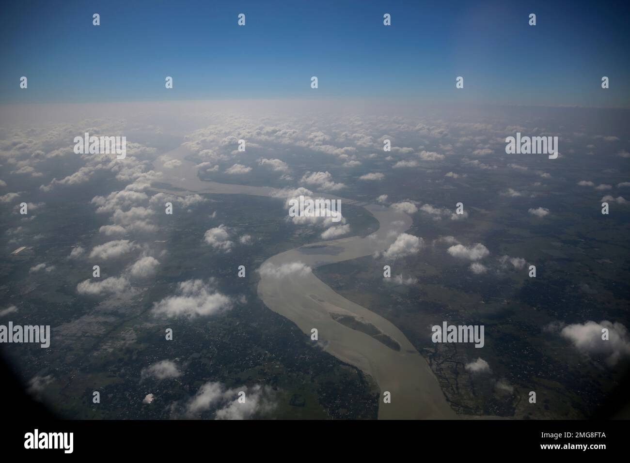 This aerial view shows the river Hooghly, a distributary of the Ganges ...