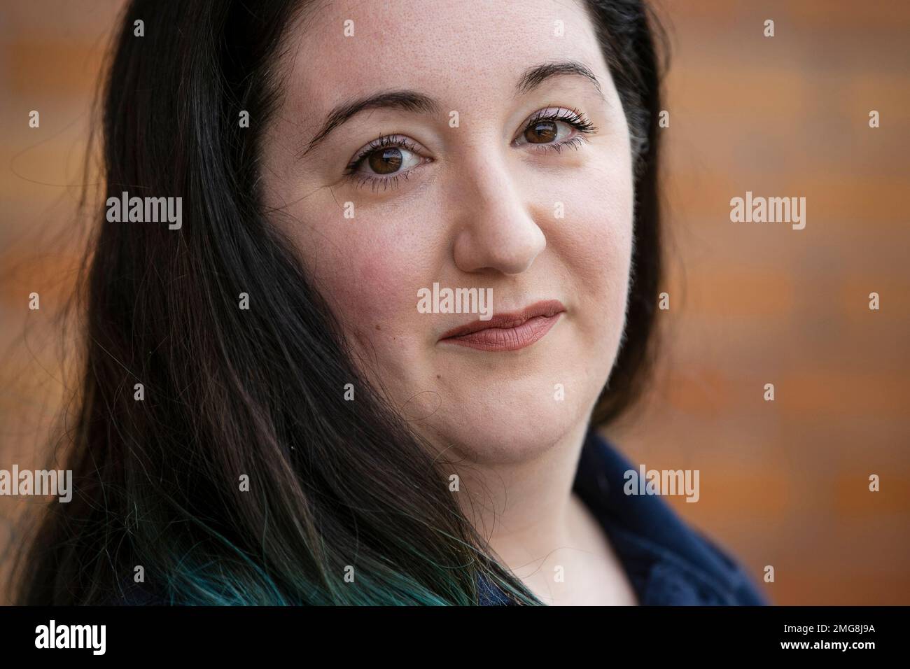 Lisa Fitzgerald O'Connor poses for photographs at M.S. 324 Thursday ...