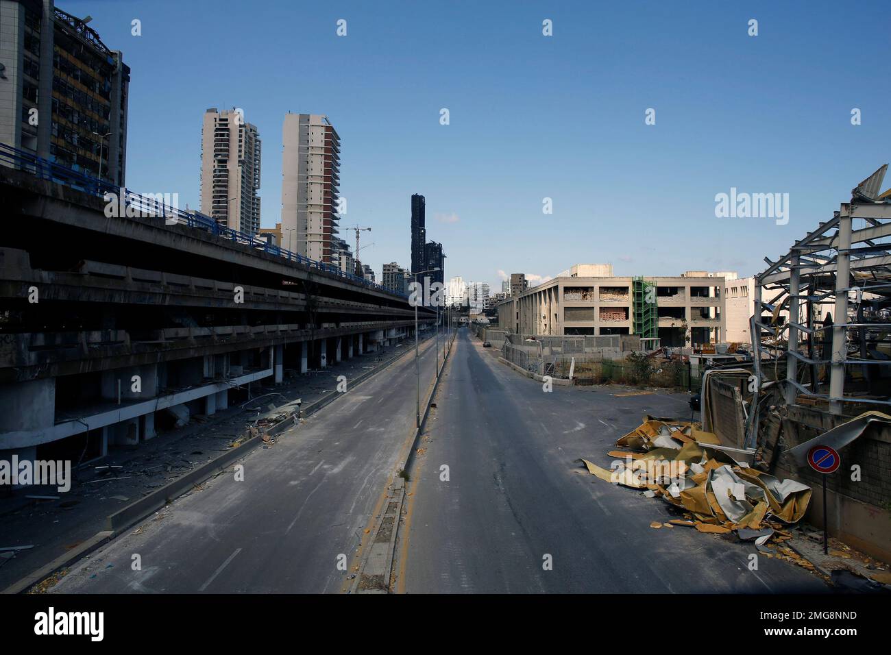 This photo shows an empty road leading to a seaport of Beirut, Lebanon ...