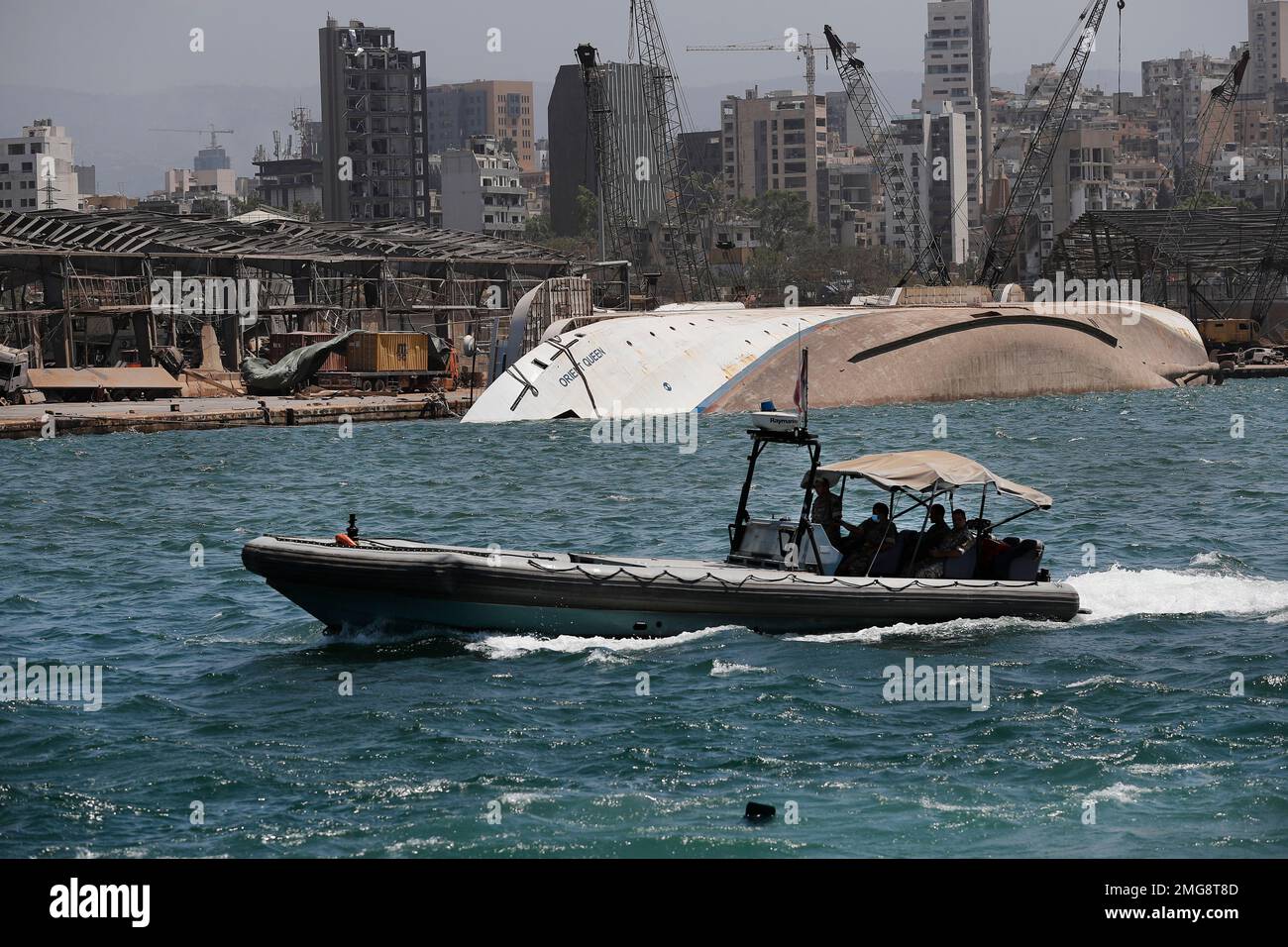 Lebanese navy patrol in front a cruise ship that sank by Tuesday's ...