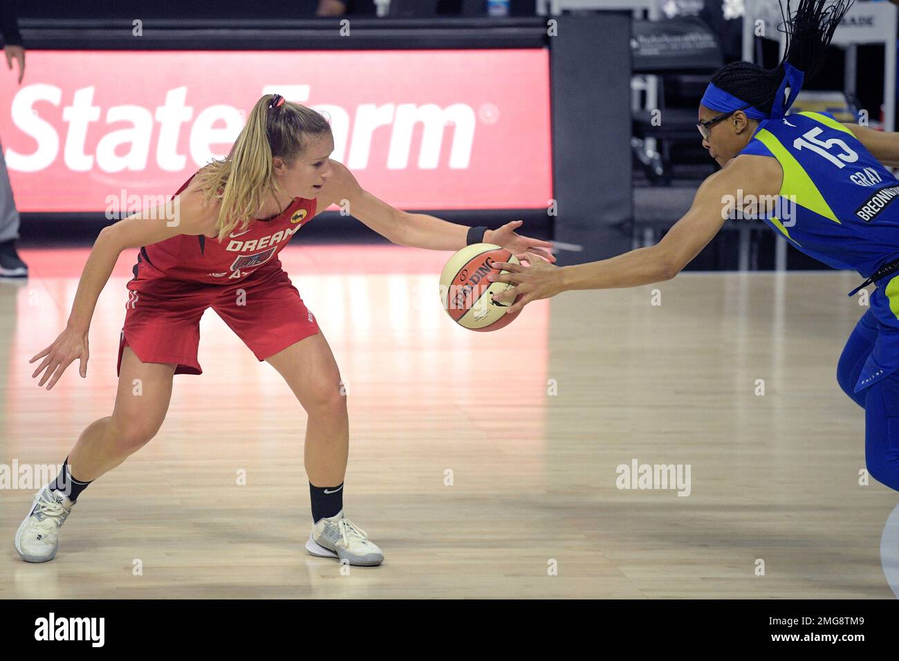 Dallas Wings guard Allisha Gray, right, steals the ball from Atlanta ...