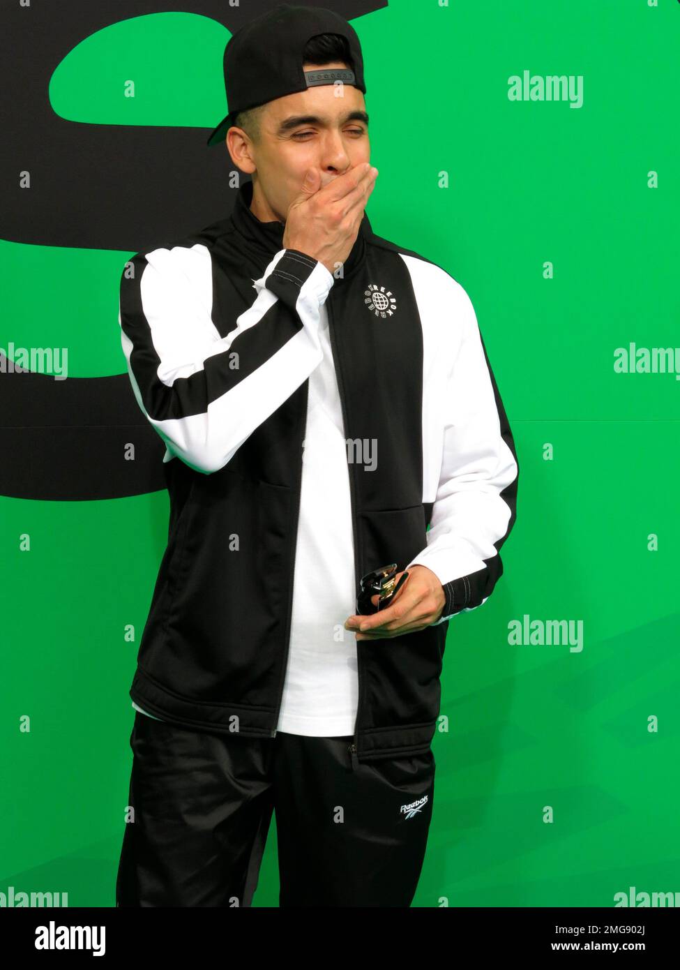 The Mexican raper MC Davo poses for photographers as he arrives at the ...