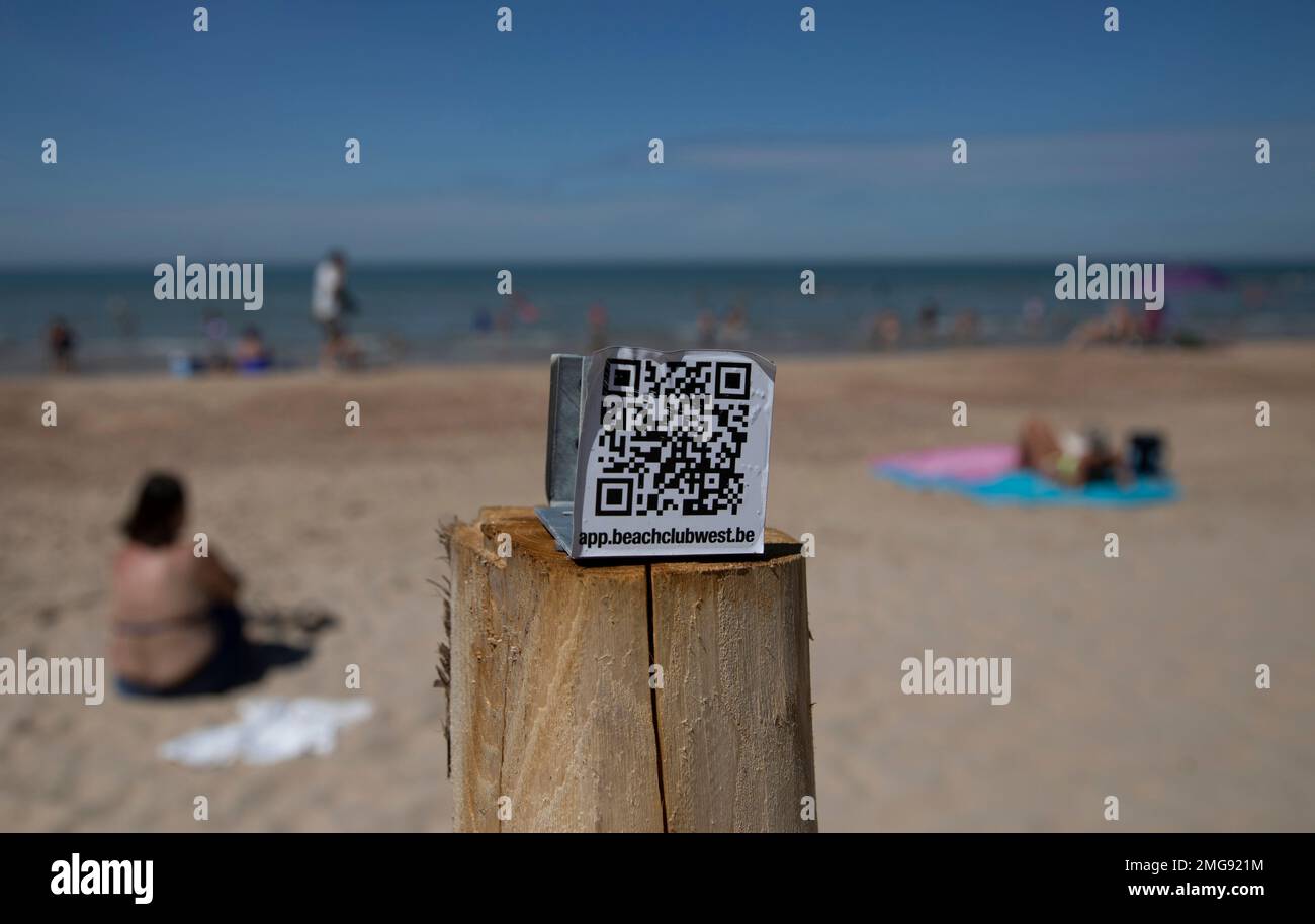 A QR code is placed on a peg leading to a private beach club in Ostend ...