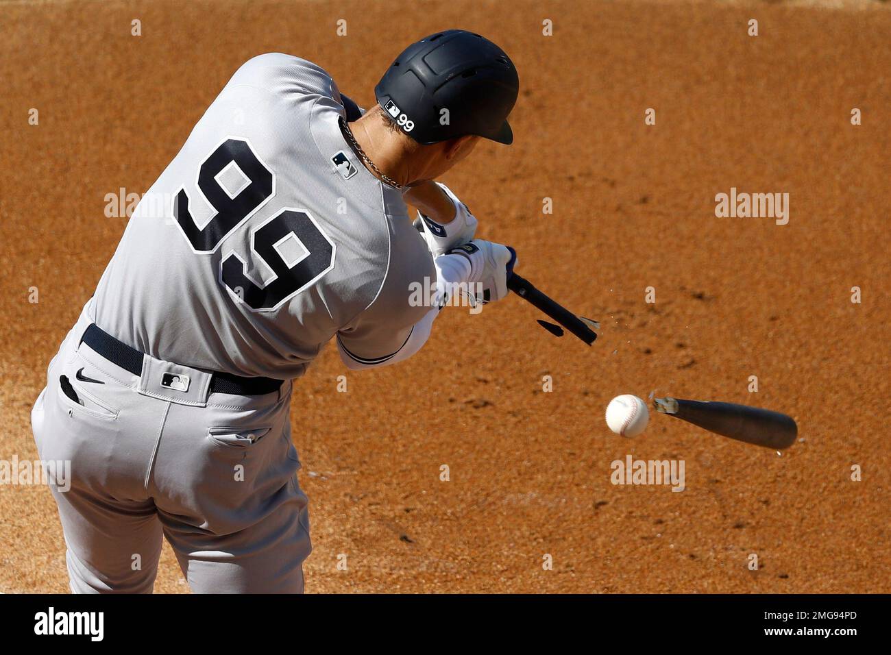 New York Yankees' Aaron Judge breaks his bat after hitting into a ...