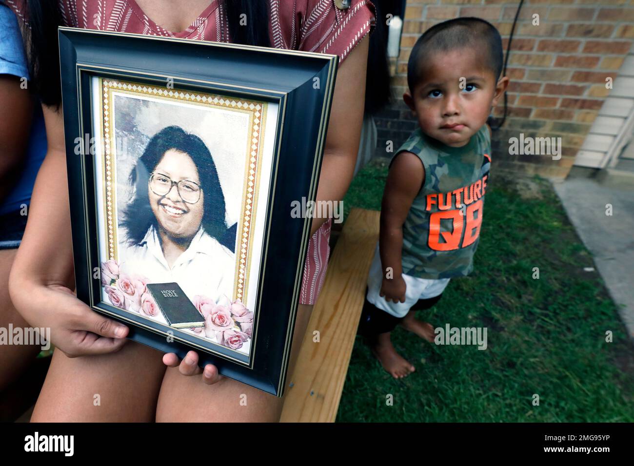 Kristina Taylor, 18, holds a portrait of her late mother, Sharon Taylor ...