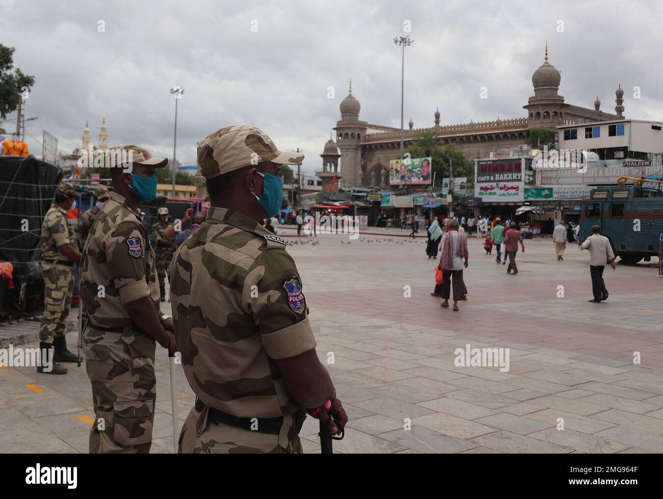 Indian security officers stand guard in front of Mecca Masjid ahead of ...