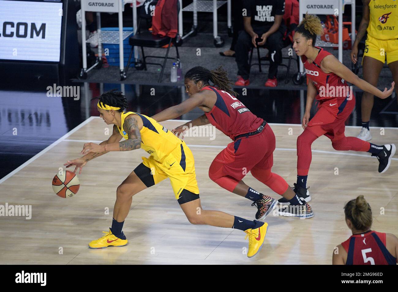Indiana Fever forward Candice Dupree drives to the basket in front of ...
