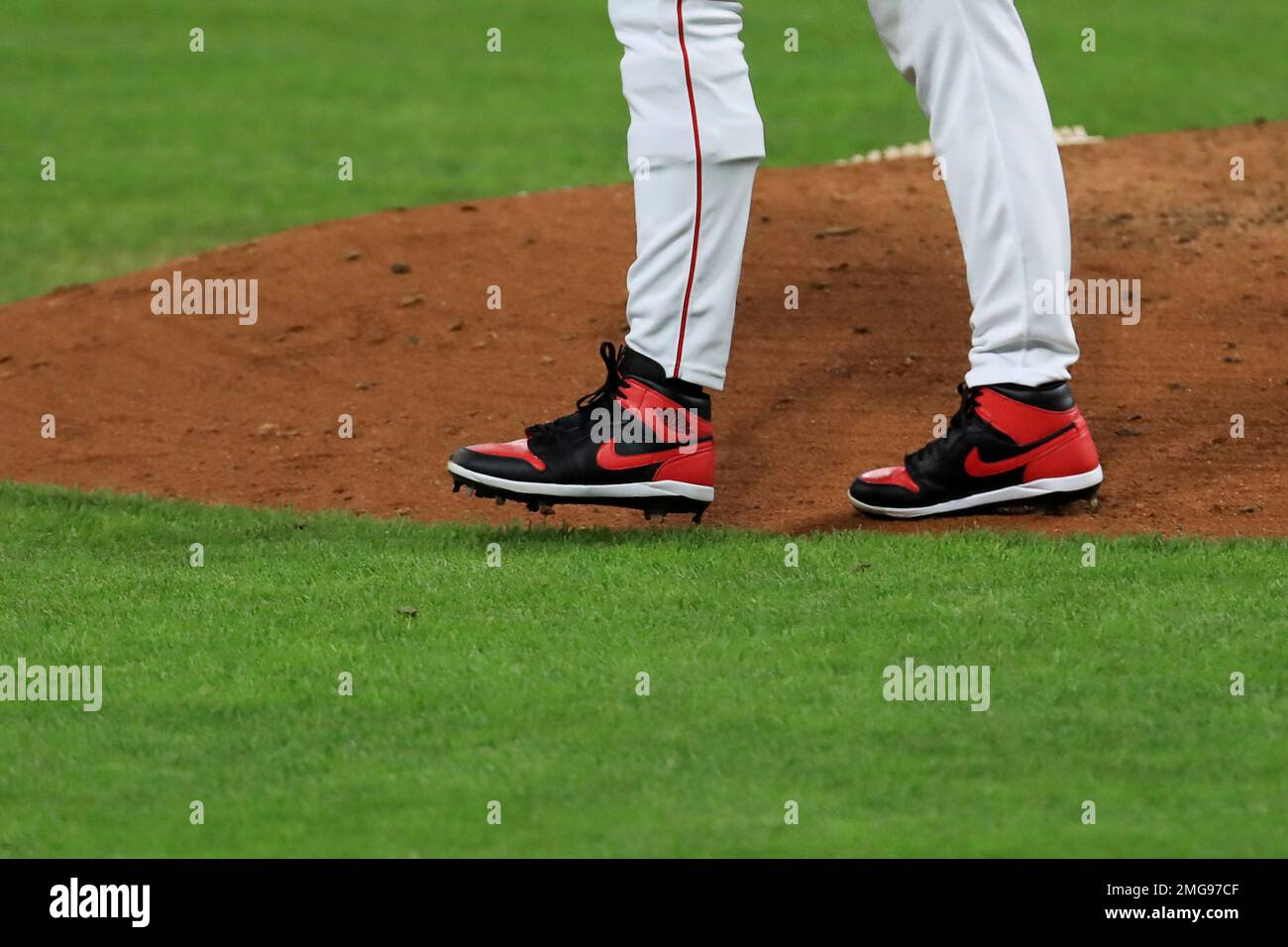 A view of the Air Jordan 1 Retro Bred Banned cleats worn by Cincinnati ...