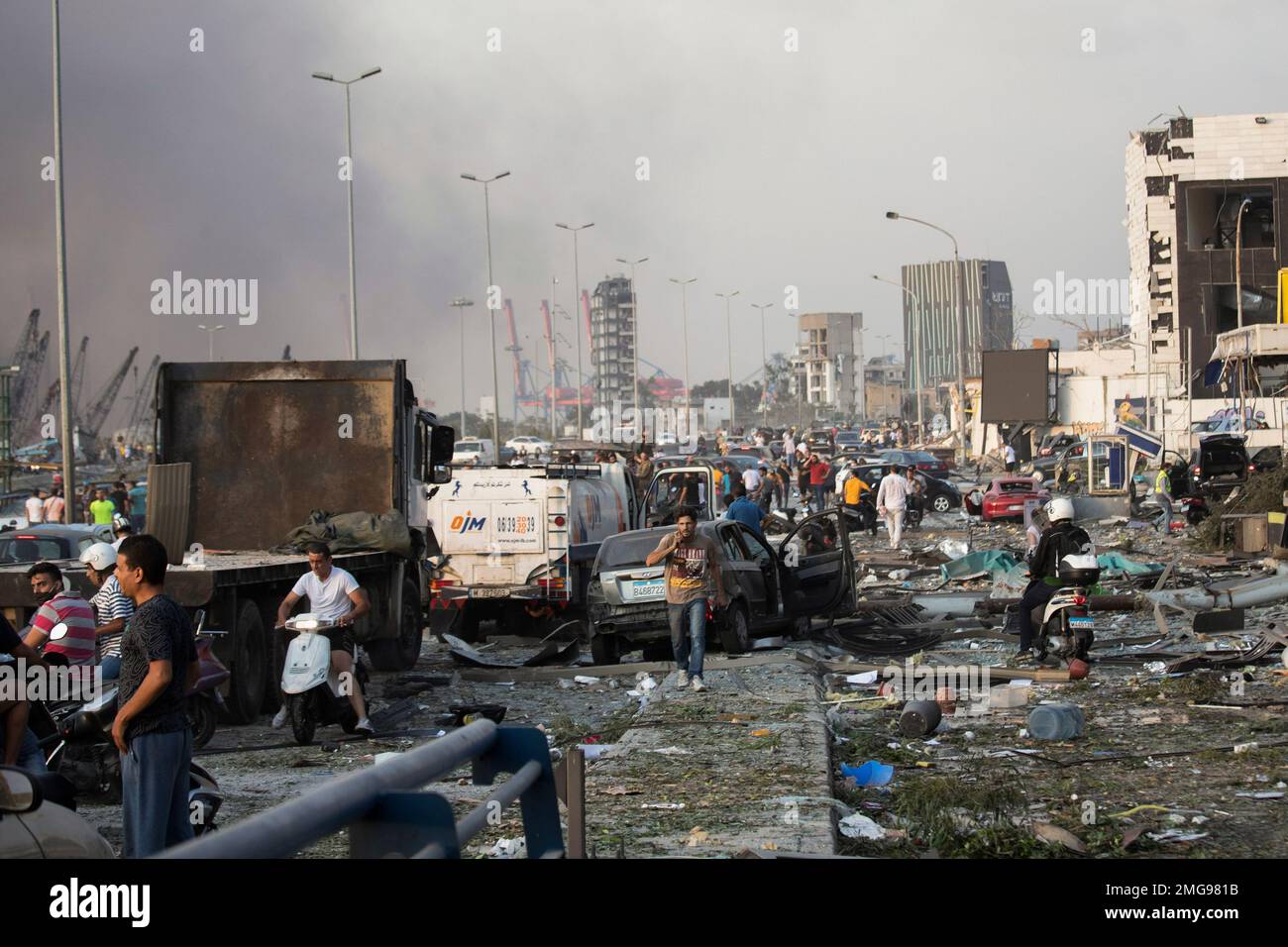 People evacuate wounded after of a massive explosion in Beirut, Lebanon ...