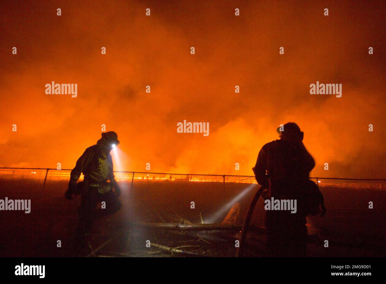 Firefighters battle the Apple Fire in Banning, Calif., Saturday, Aug. 1 ...
