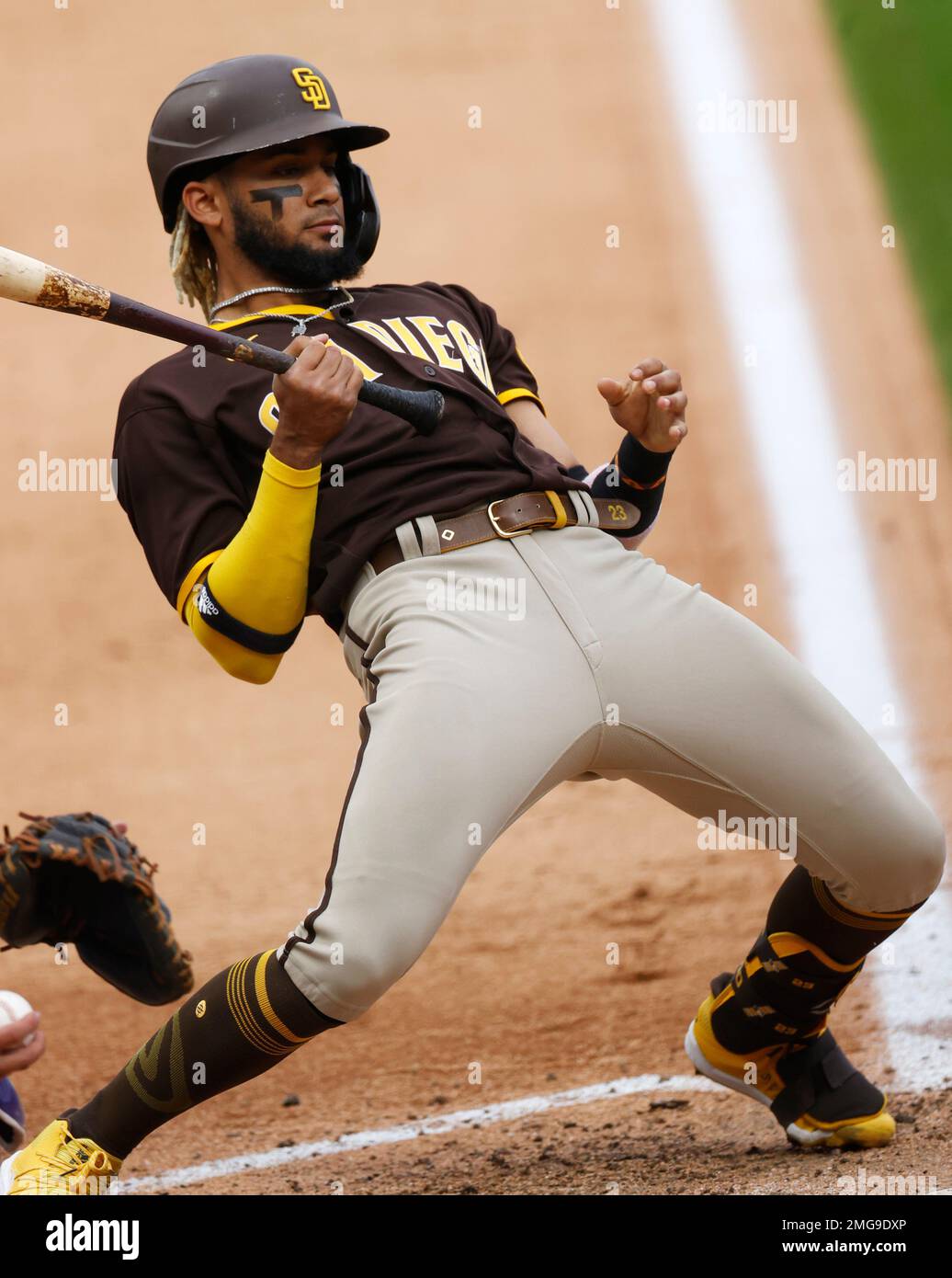 San Diego Padres' Fernando Tatis Jr. avoids an inside pitch from ...