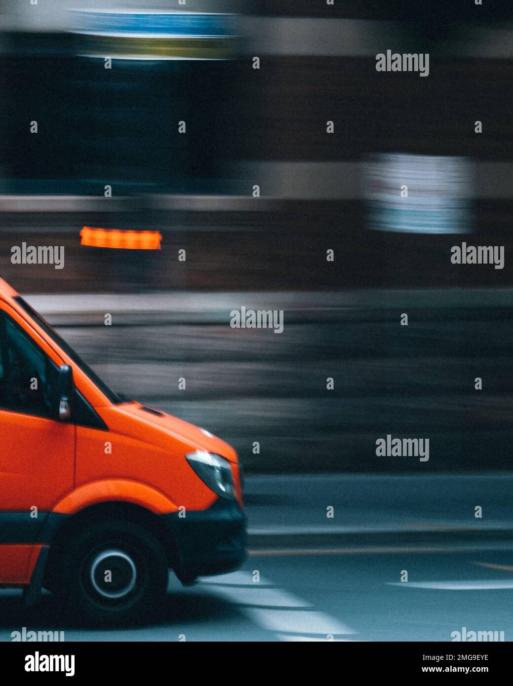 Van speeding through the city Stock Photo - Alamy