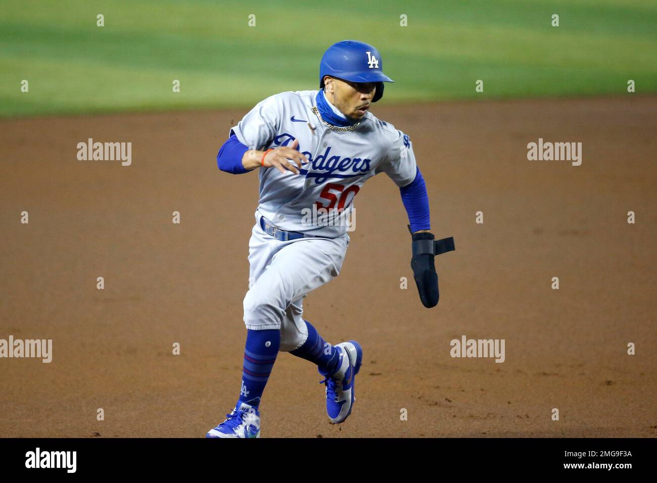 Los Angeles Dodgers' Mookie Betts runs to third base against the ...