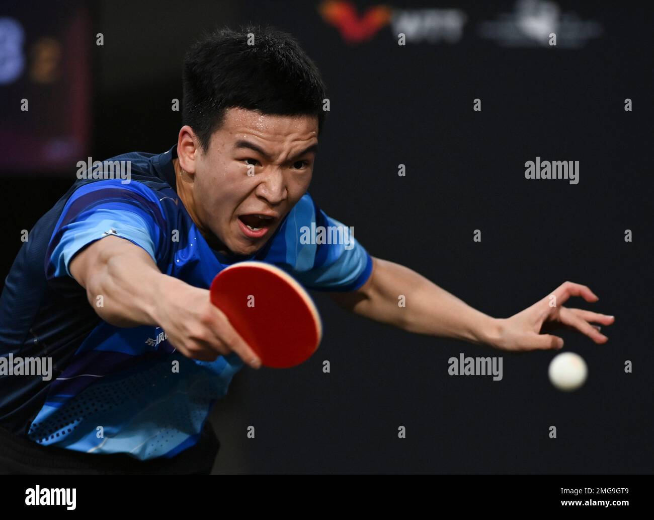 Doha, Qatar. 25th Jan, 2023. Xiang Peng of China hits a return during ...