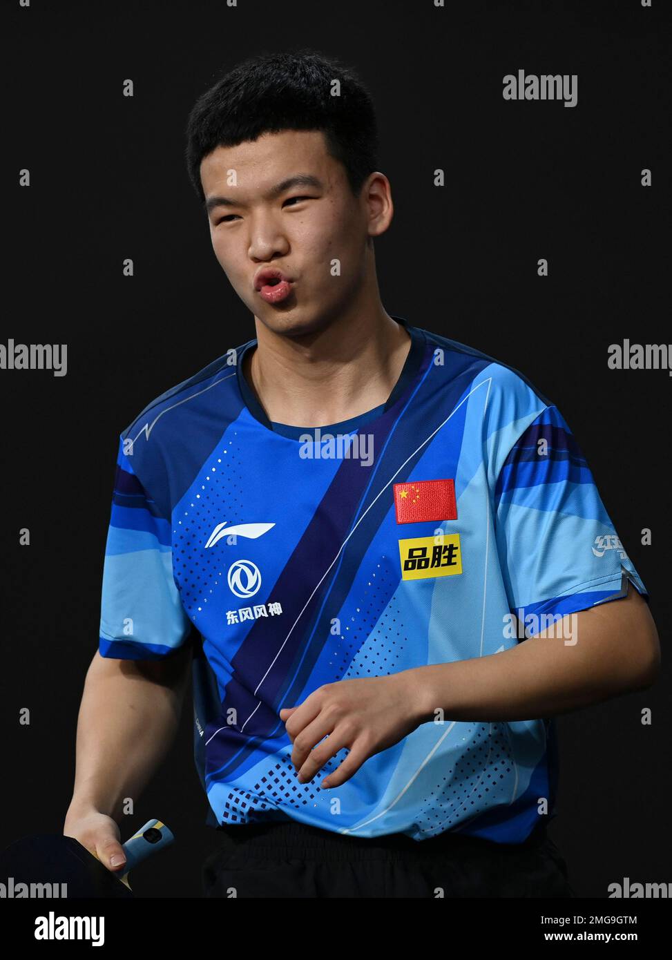 Doha, Qatar. 25th Jan, 2023. Xiang Peng of China reacts during the men ...